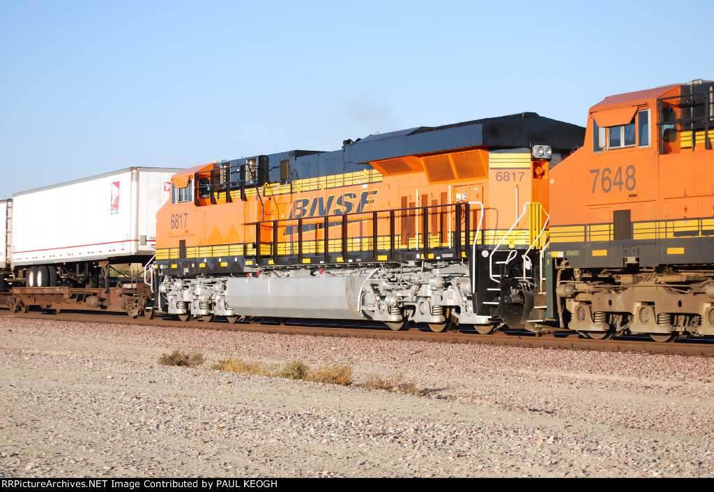 BNSF 6817 Gleems at 08:30 am as she rolls east as a #4 unit.